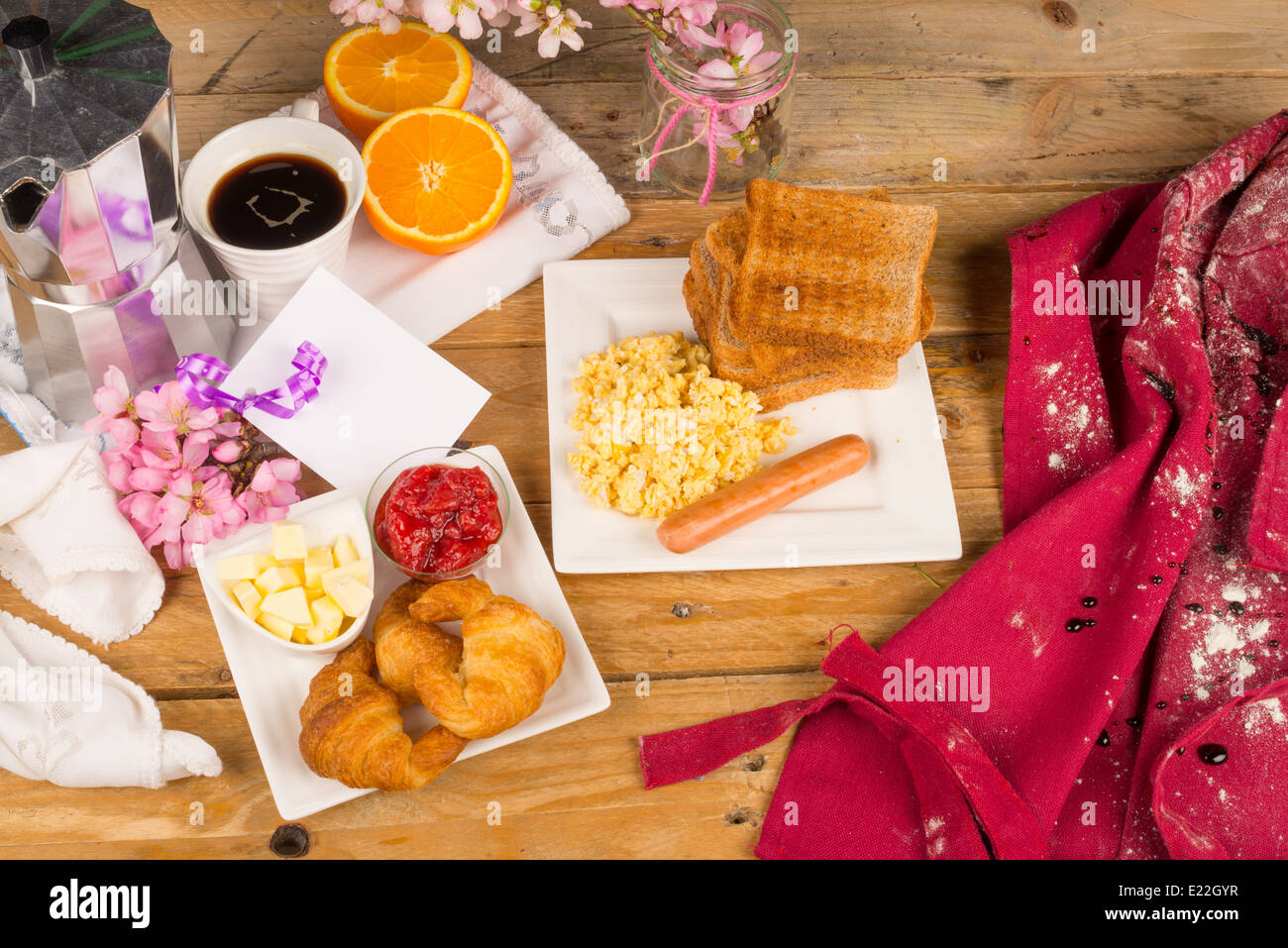 Messy breakfast table, a kid having it set up for its parents Stock ...
