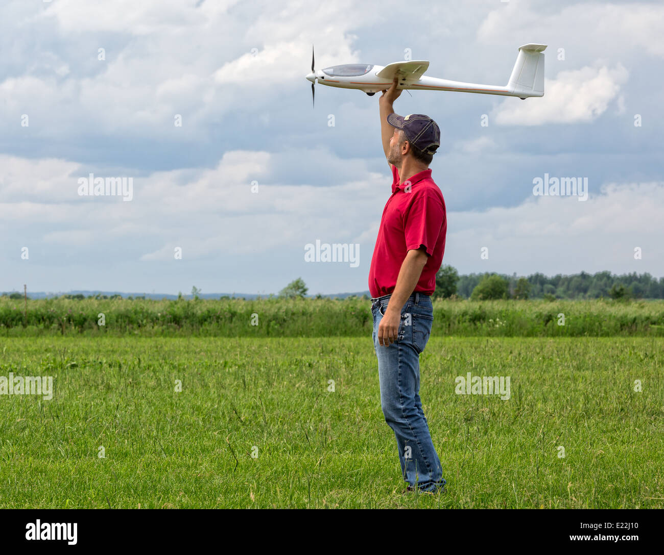 Man launches into the sky RC glider, blue sky background Stock Photo ...