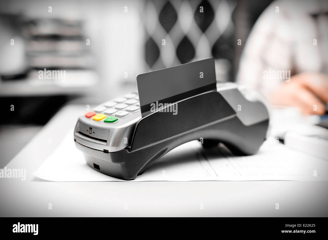 Bank terminal and payment card on the office table Stock Photo - Alamy