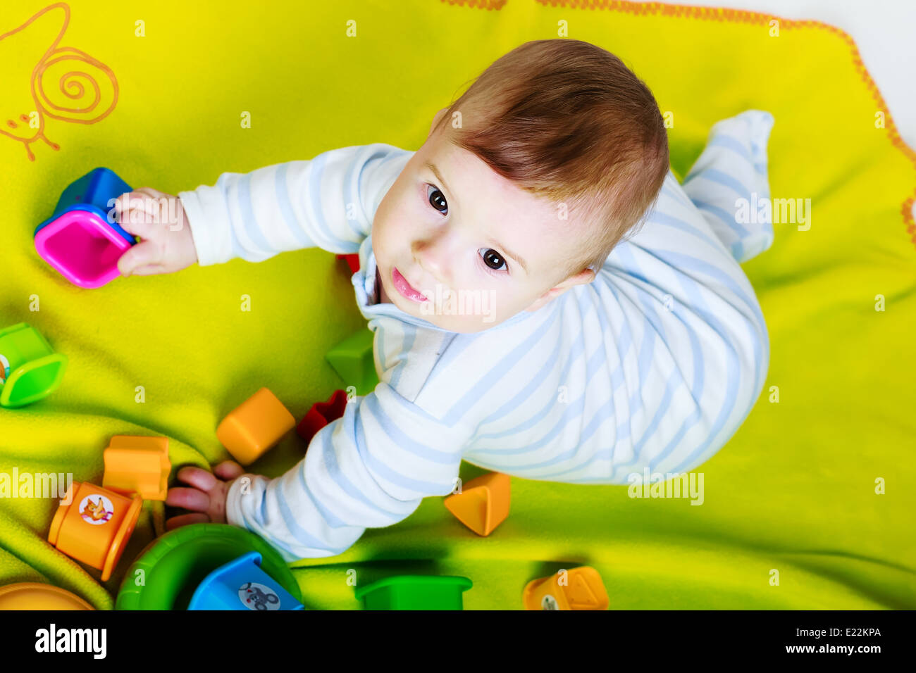 Studio photography. Little baby boy with toys Stock Photo - Alamy