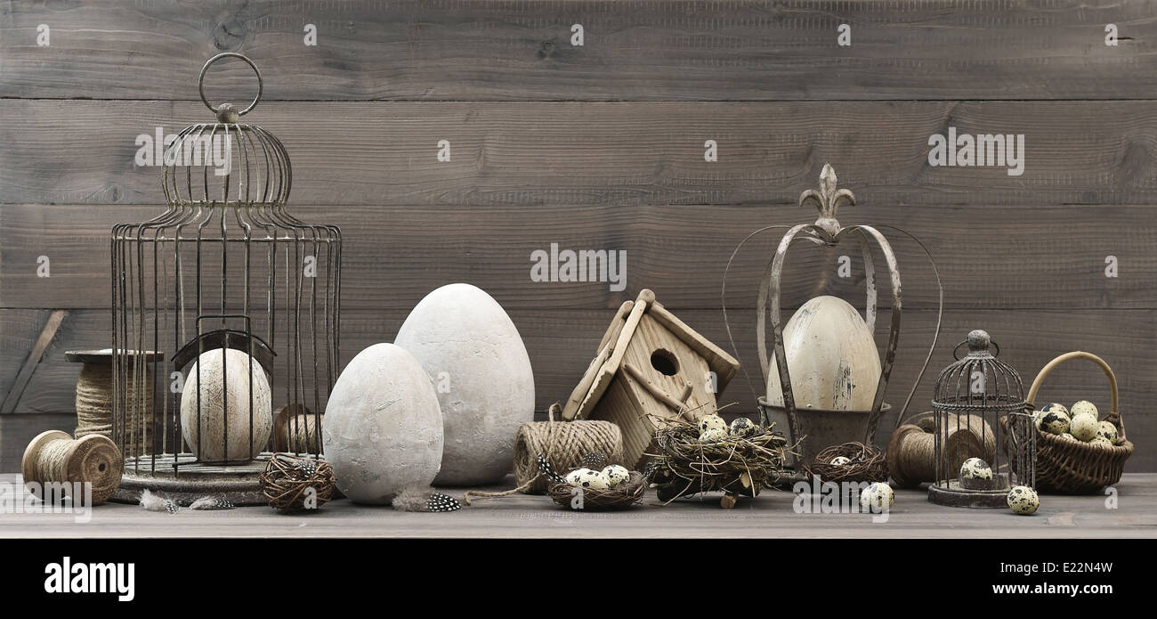 nostalgic easter decoration with eggs, nest and birdcage. vintage still ...