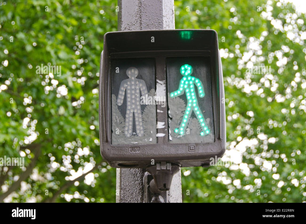 green traffic light signal sign in city street Stock Photo - Alamy