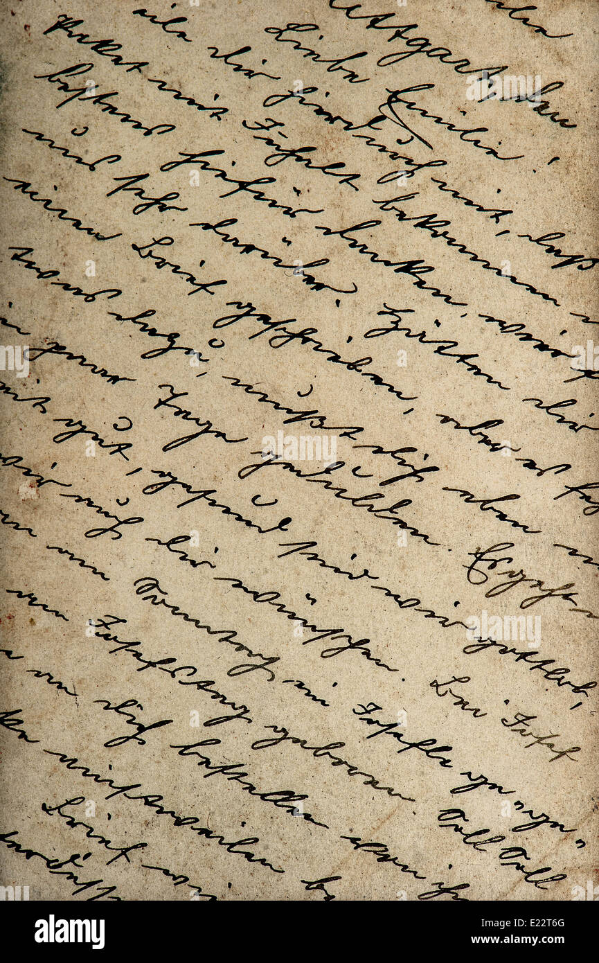 old handwritten text from ca. 1900. grunge textured paper background ...