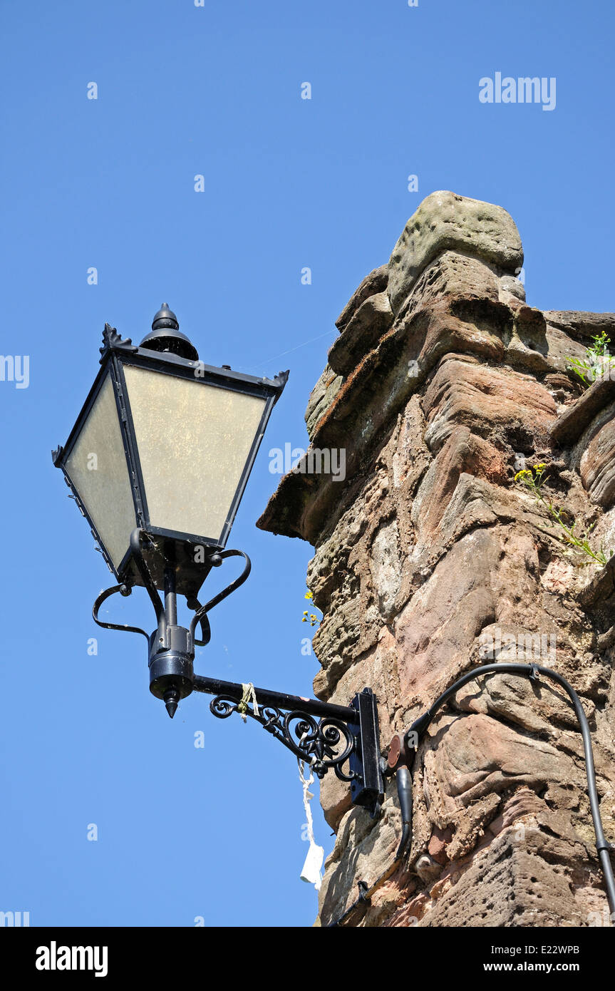 Street light lamp stone wall hi-res stock photography and images - Alamy