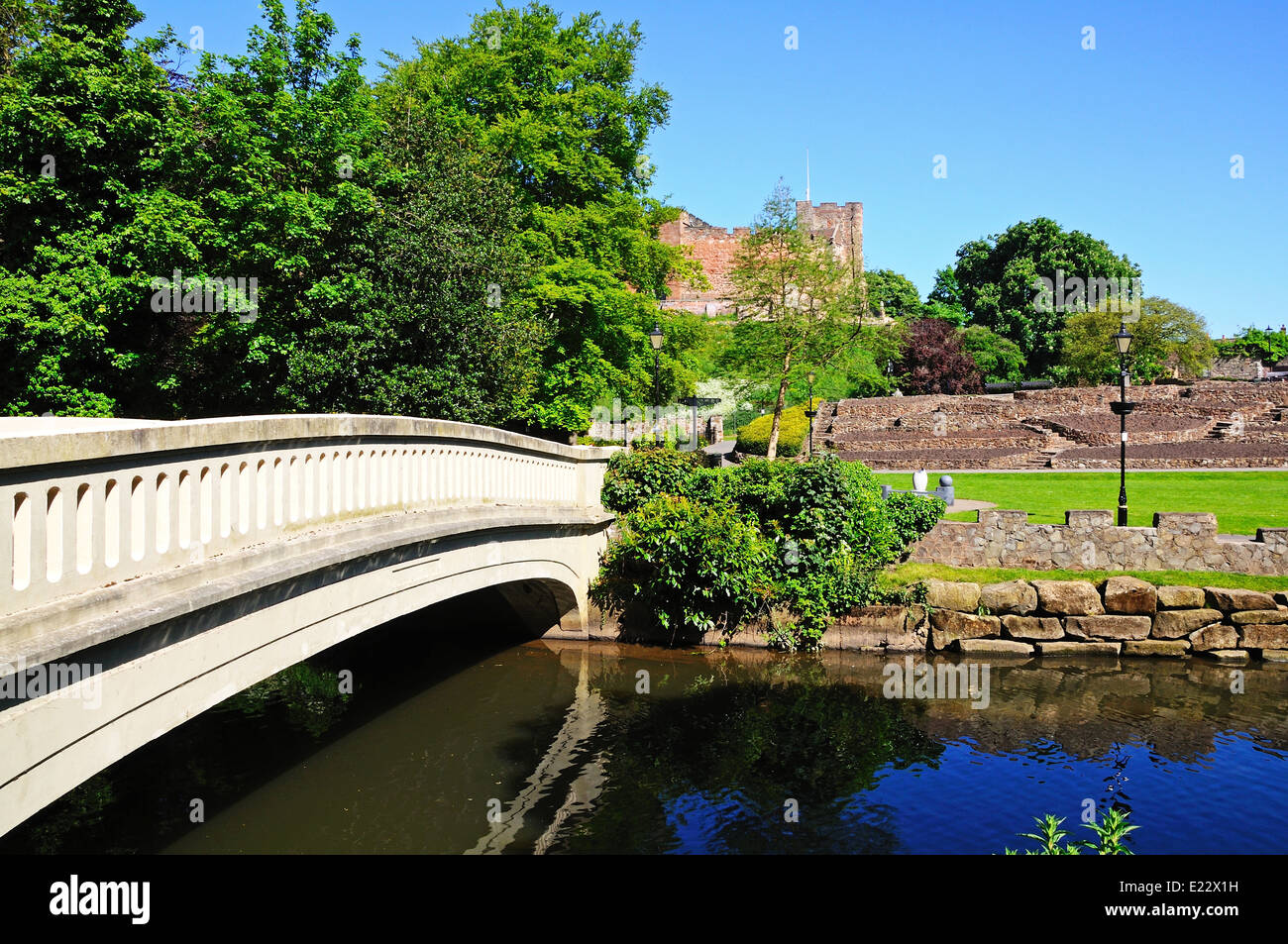 Footbridge over River Anker with the Norman castle and gardens to the ...