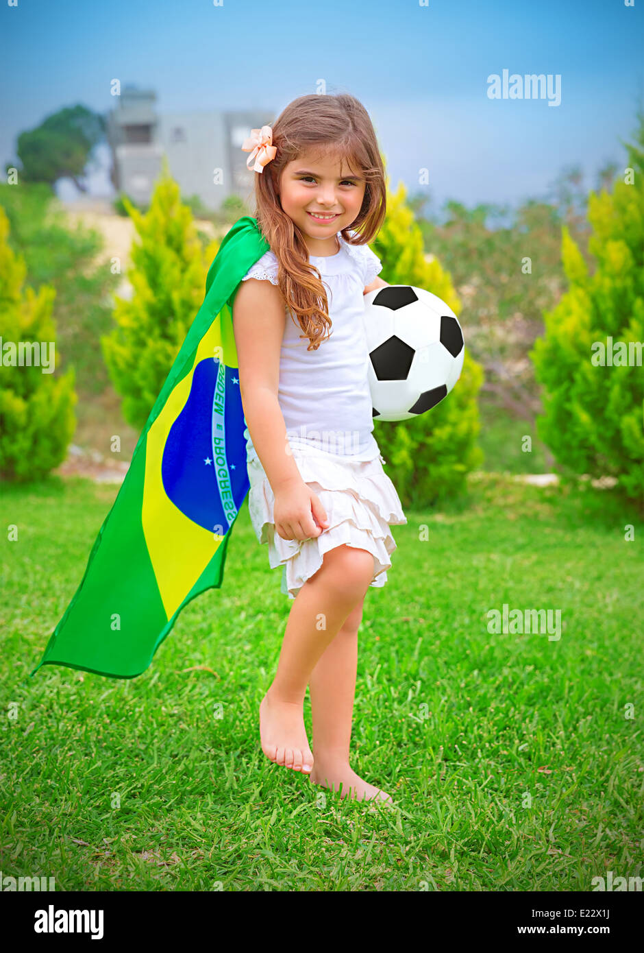 Kids playing football in brazil hi-res stock photography and images - Alamy