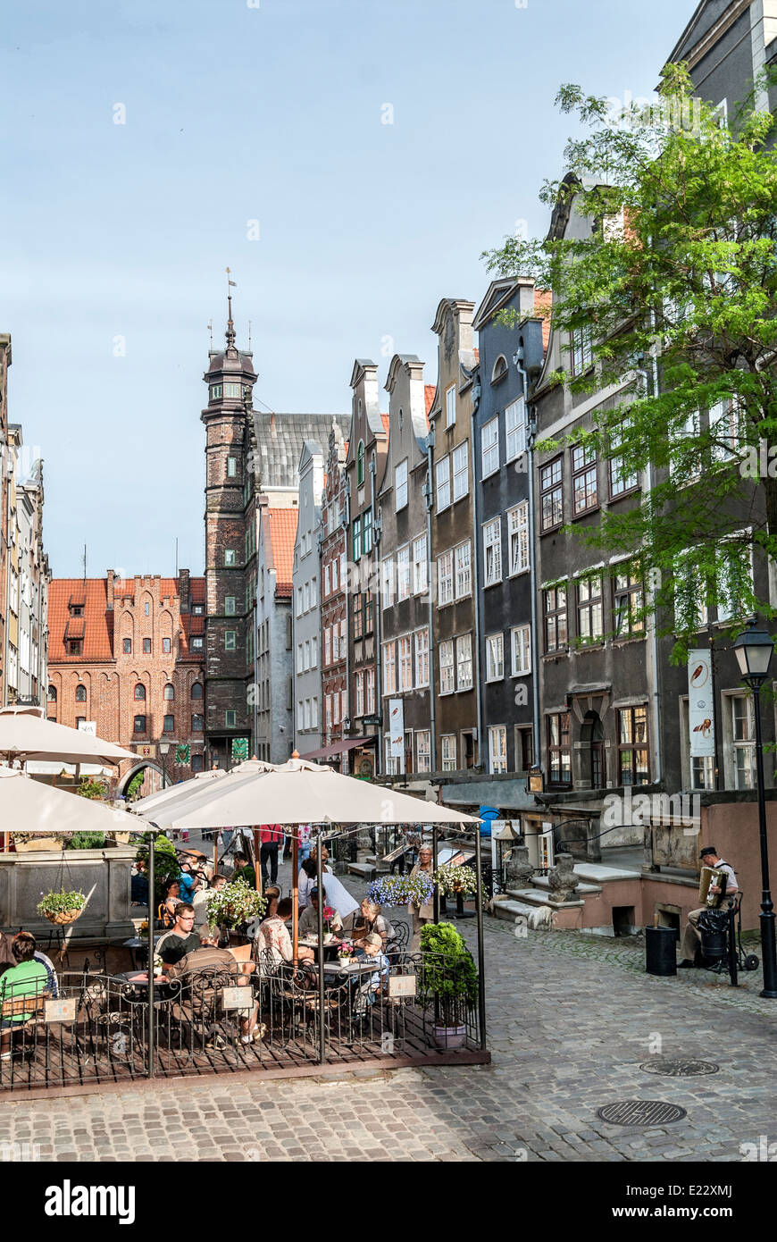 Tourists and Locals shopping and sightseeing in the historical old town ...