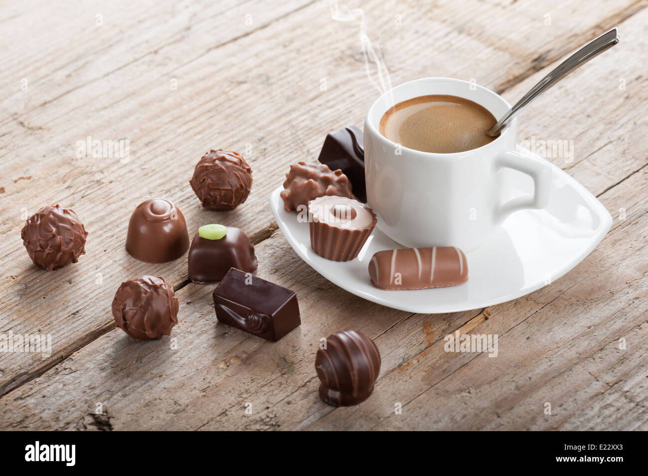 assorted chocolates confectionery with cup of coffee Stock Photo - Alamy