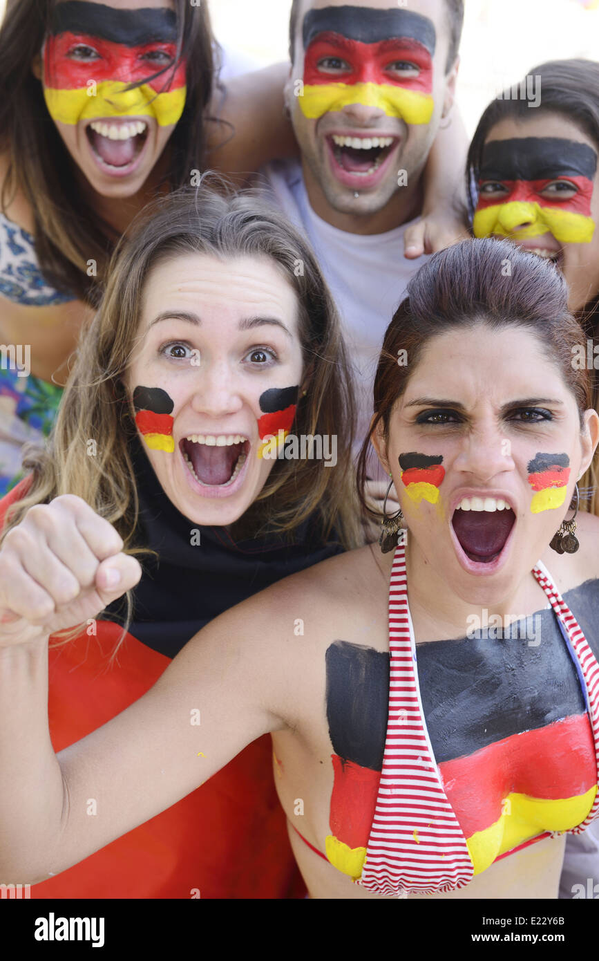Group of happy german soccer fans commemorating victory yelling Stock ...