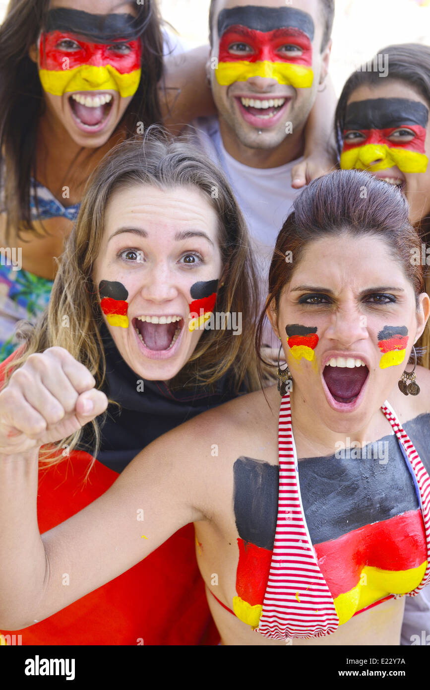 Group of happy german soccer fans commemorating victory yelling Stock ...