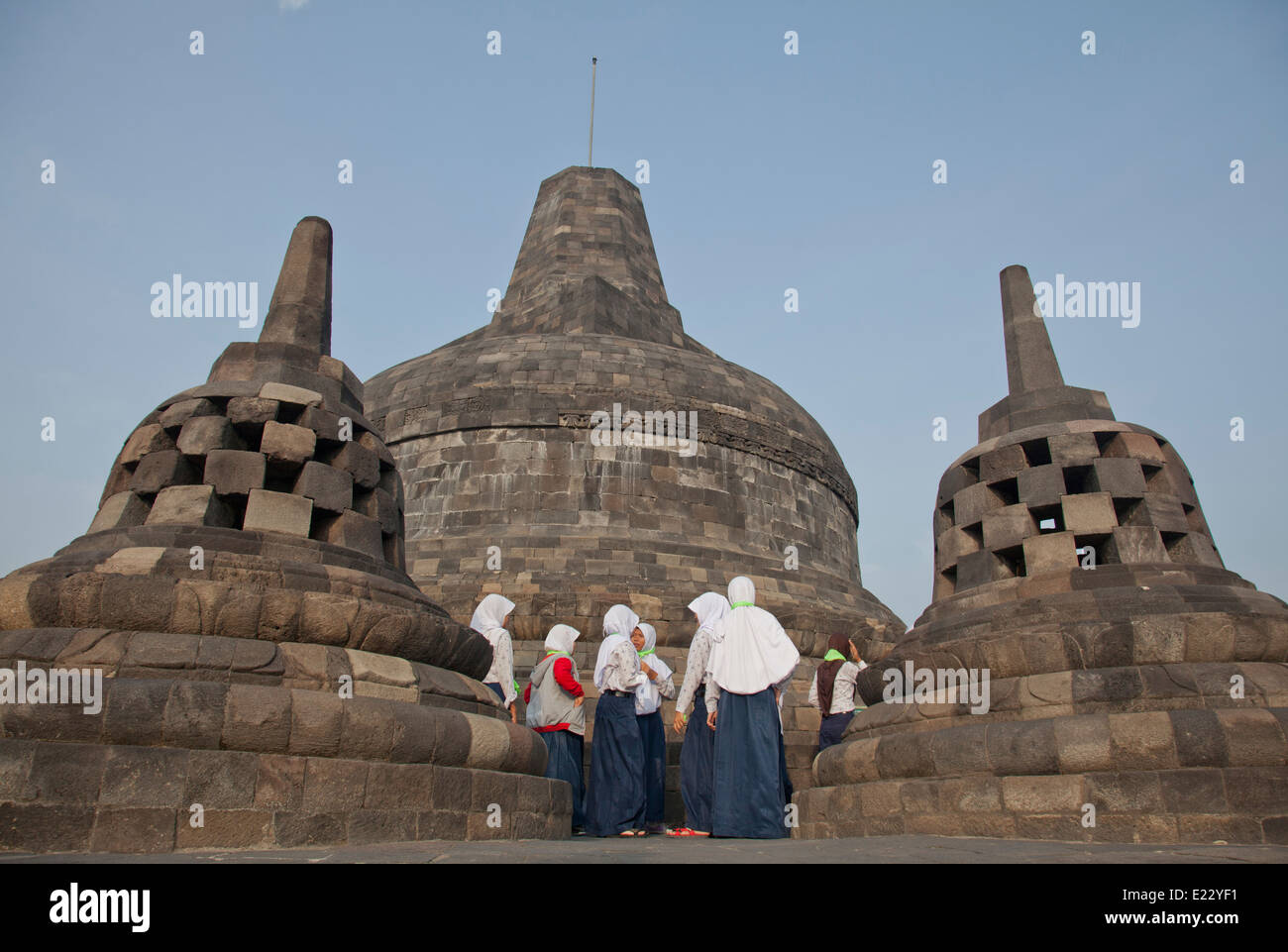 Muslim girls visiting the ancient Borobudur Buddhist temple near ...