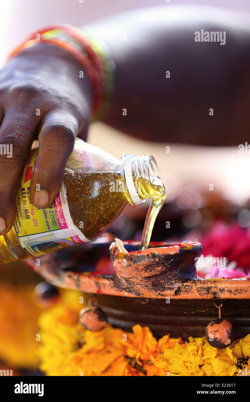 Woman pouring oil hi-res stock photography and images - Alamy