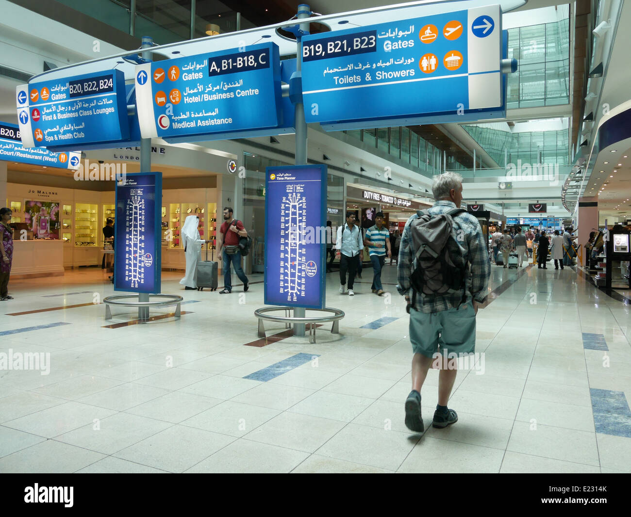 Departure gate flight information screens inside Dubai International ...