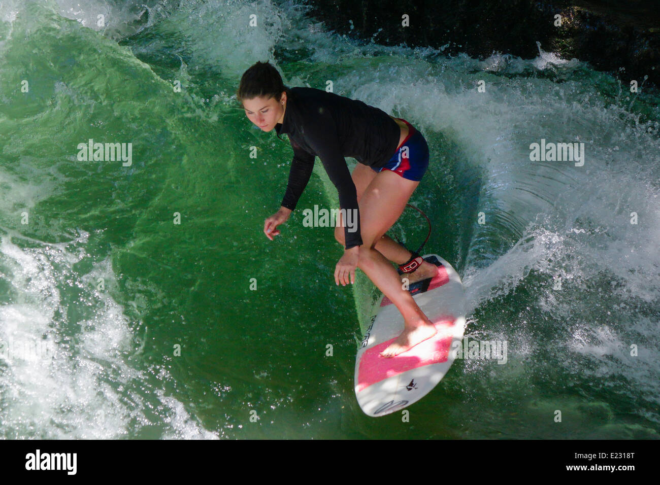 Female surfers on wave hi-res stock photography and images - Alamy