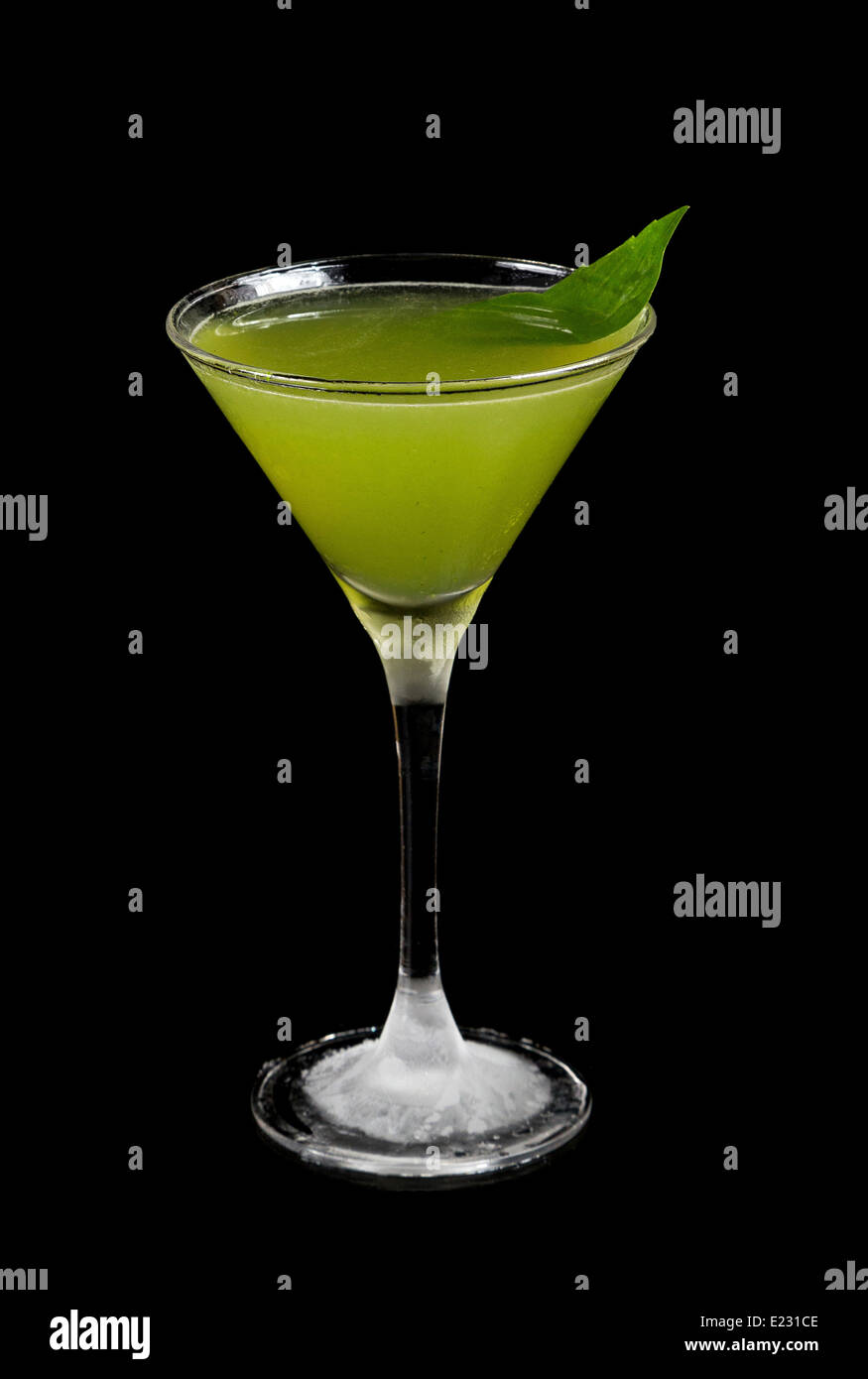 mix alcohol cocktail in glass on black background Stock Photo - Alamy