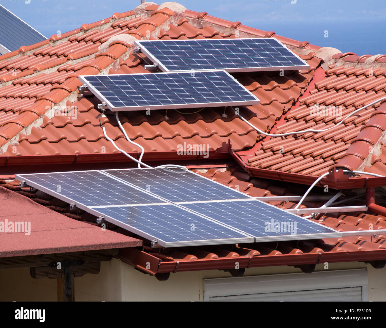 Solar panels on the rooftop of a house Stock Photo - Alamy