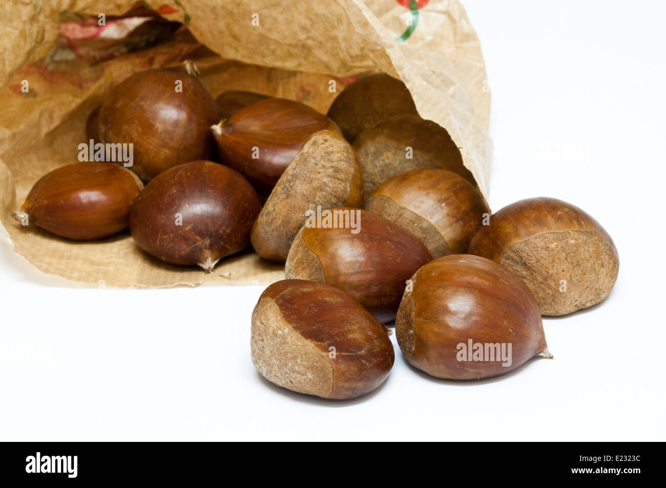 Raw chestnuts in a paper bag Stock Photo - Alamy