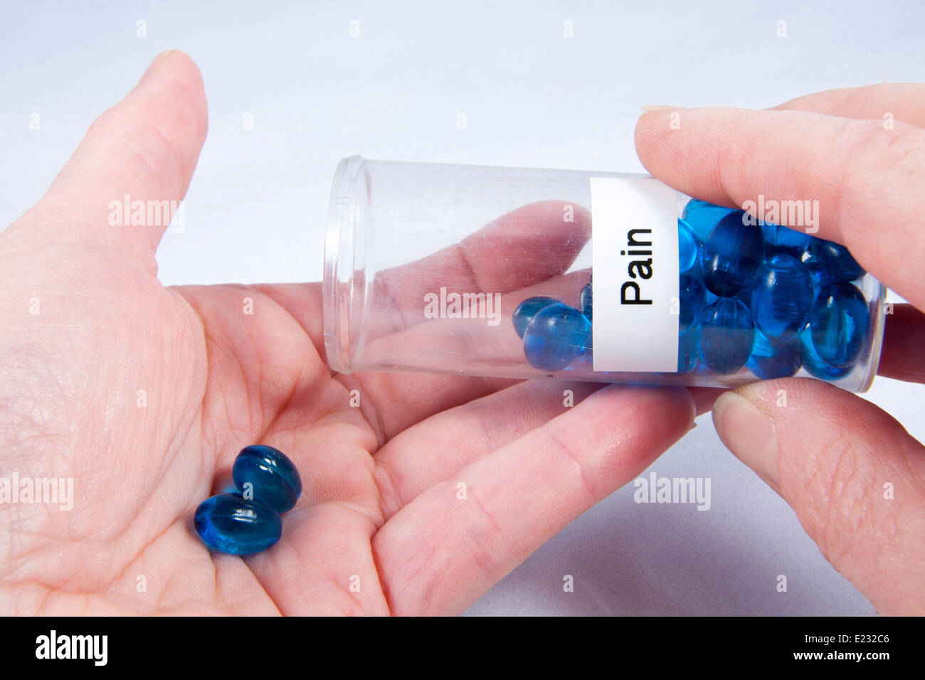 Pain killers hand hi-res stock photography and images - Alamy