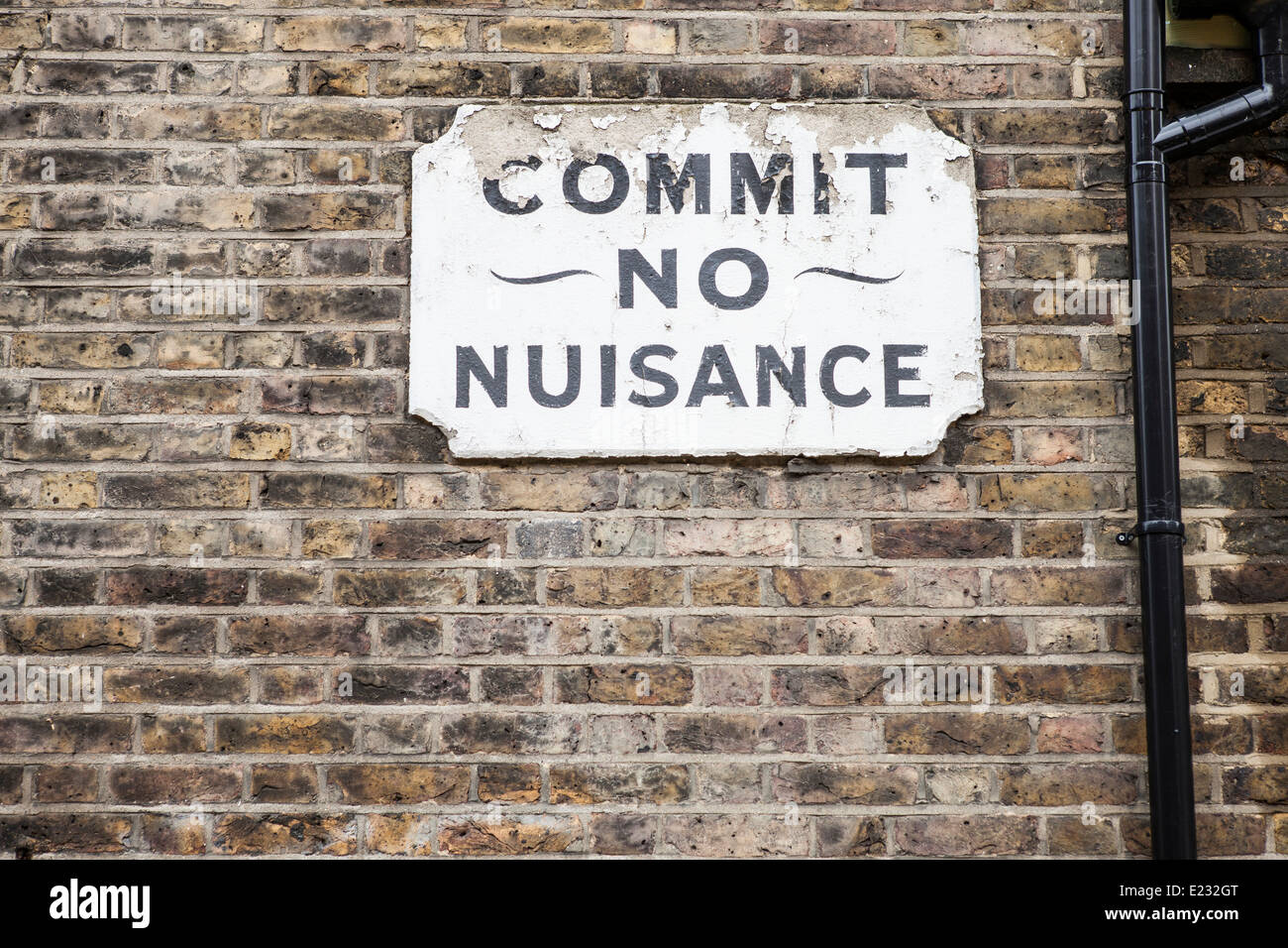 An old street sign saying "commit no nuisance" in the backstreets of ...