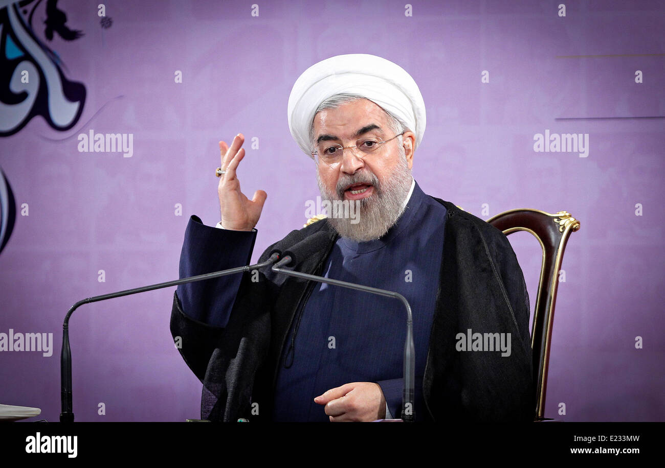 Tehran, Iran. 14th June, 2014. Iranian President Hassan Rouhani speaks ...