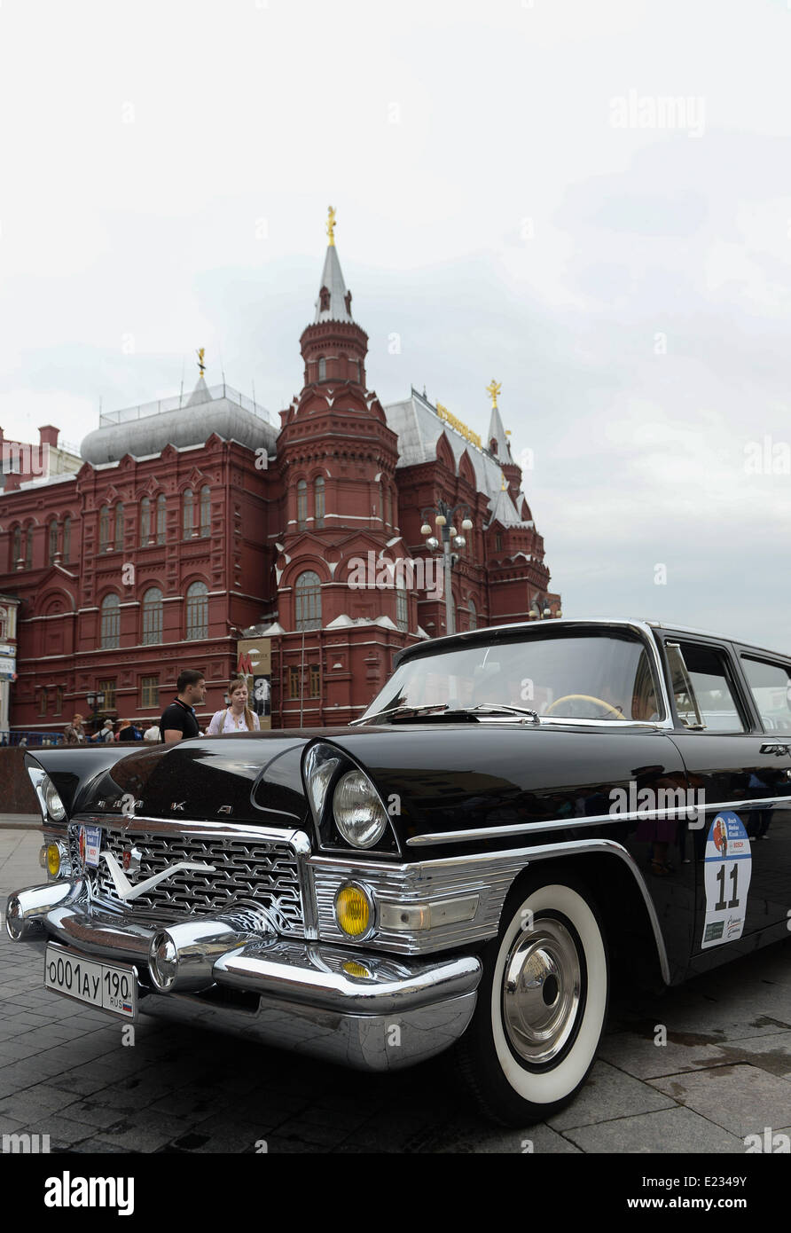 Moscow, Russia. 14th June, 2014. People watch and cheer for the classic ...