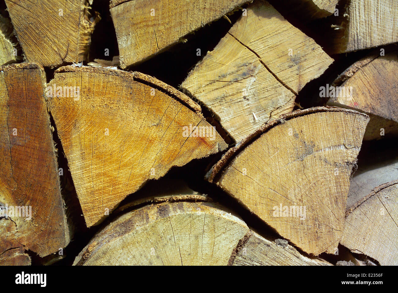 Pile of logs for fuel Stock Photo - Alamy
