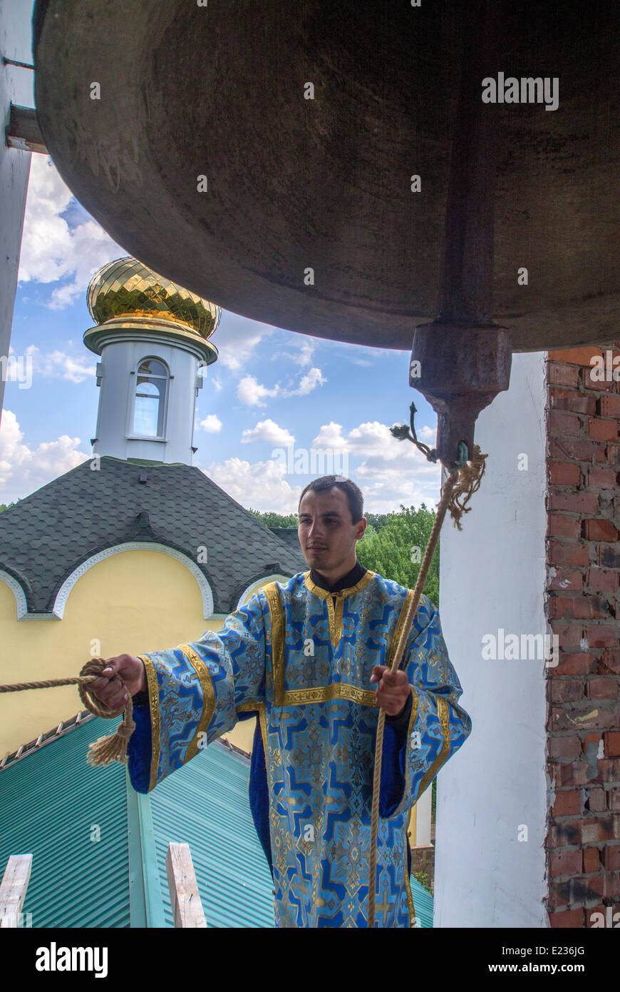 Luhansk, Ukraine. 14th June 2014. Bell ringer in the bell tower ...