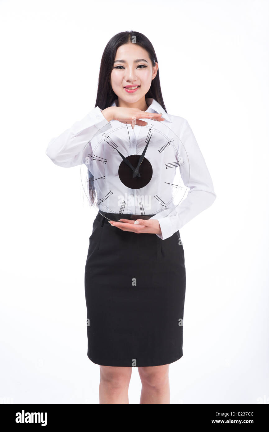 woman holding clock on white background. time management concept Stock ...