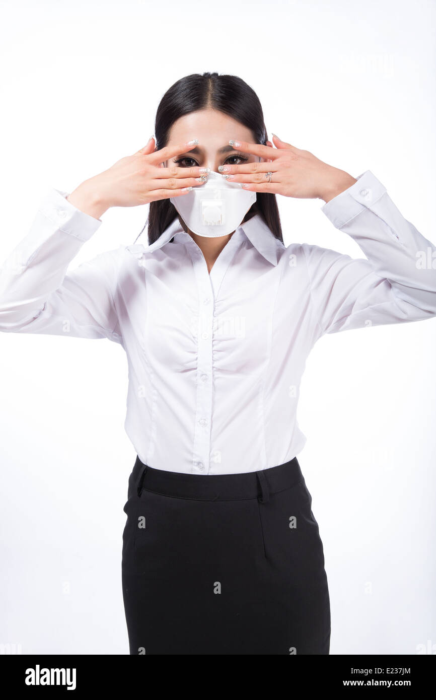 black hair girl with a mask on her face. Isolated on white Stock Photo ...