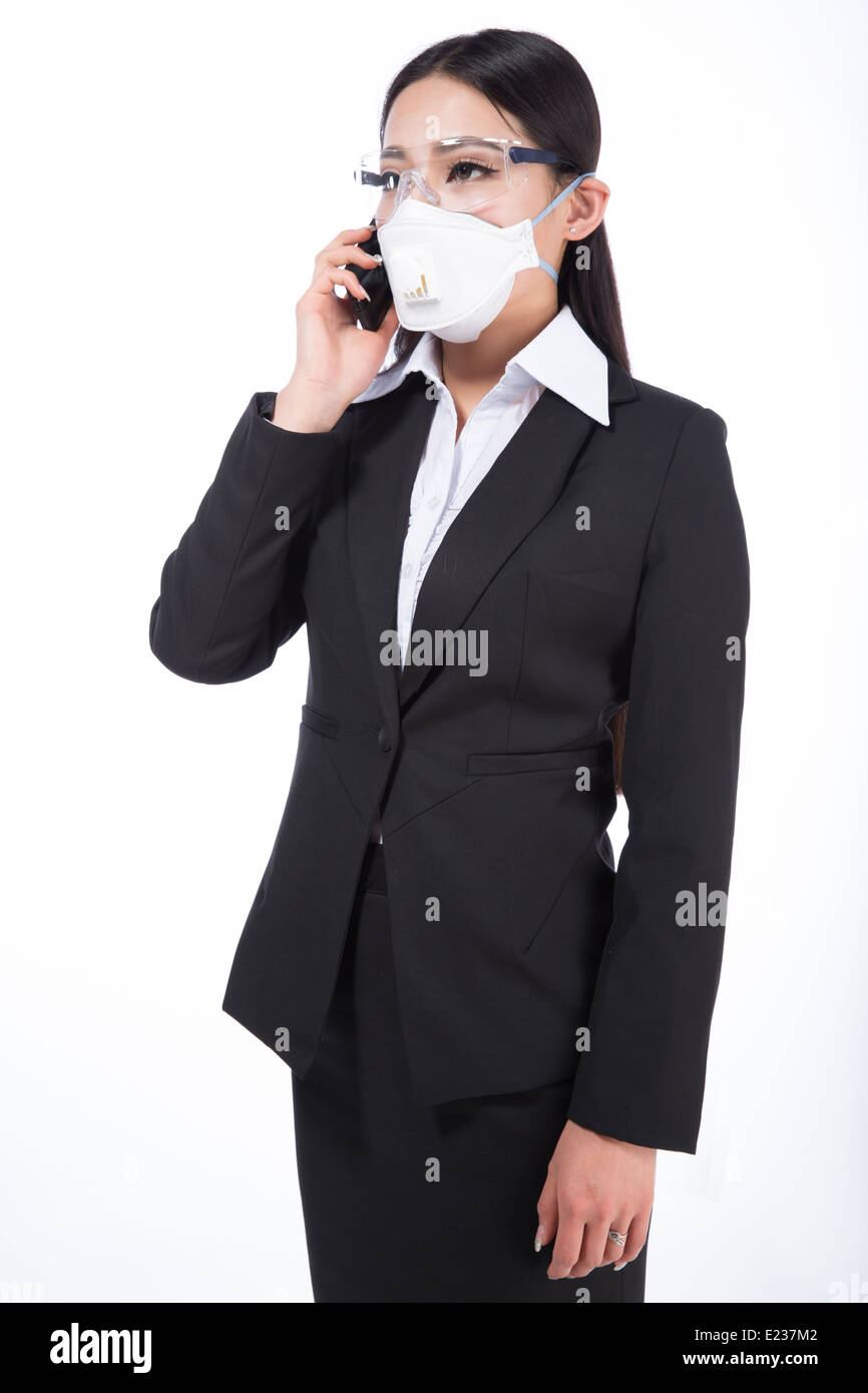 black hair girl with a mask on her face. Isolated on white Stock Photo ...