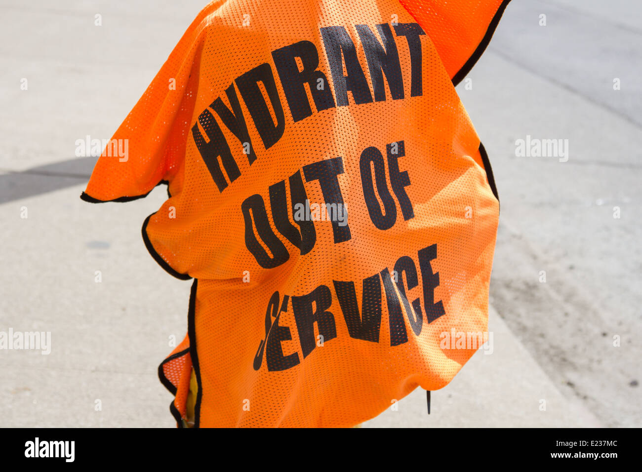 A sign saying that the Fire Hydrant is out of use Stock Photo - Alamy