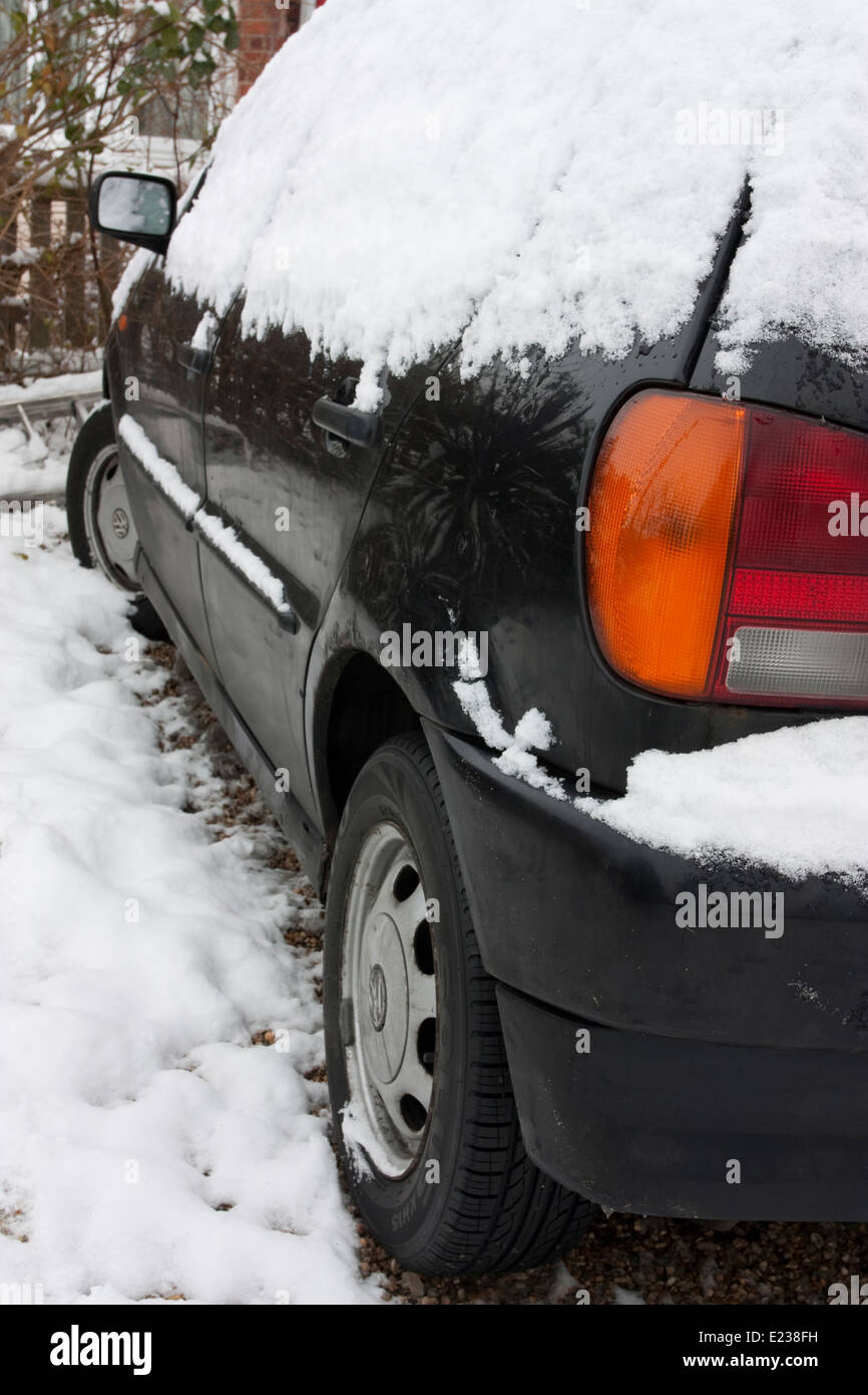 rear view of a small black car covered in snow Stock Photo - Alamy