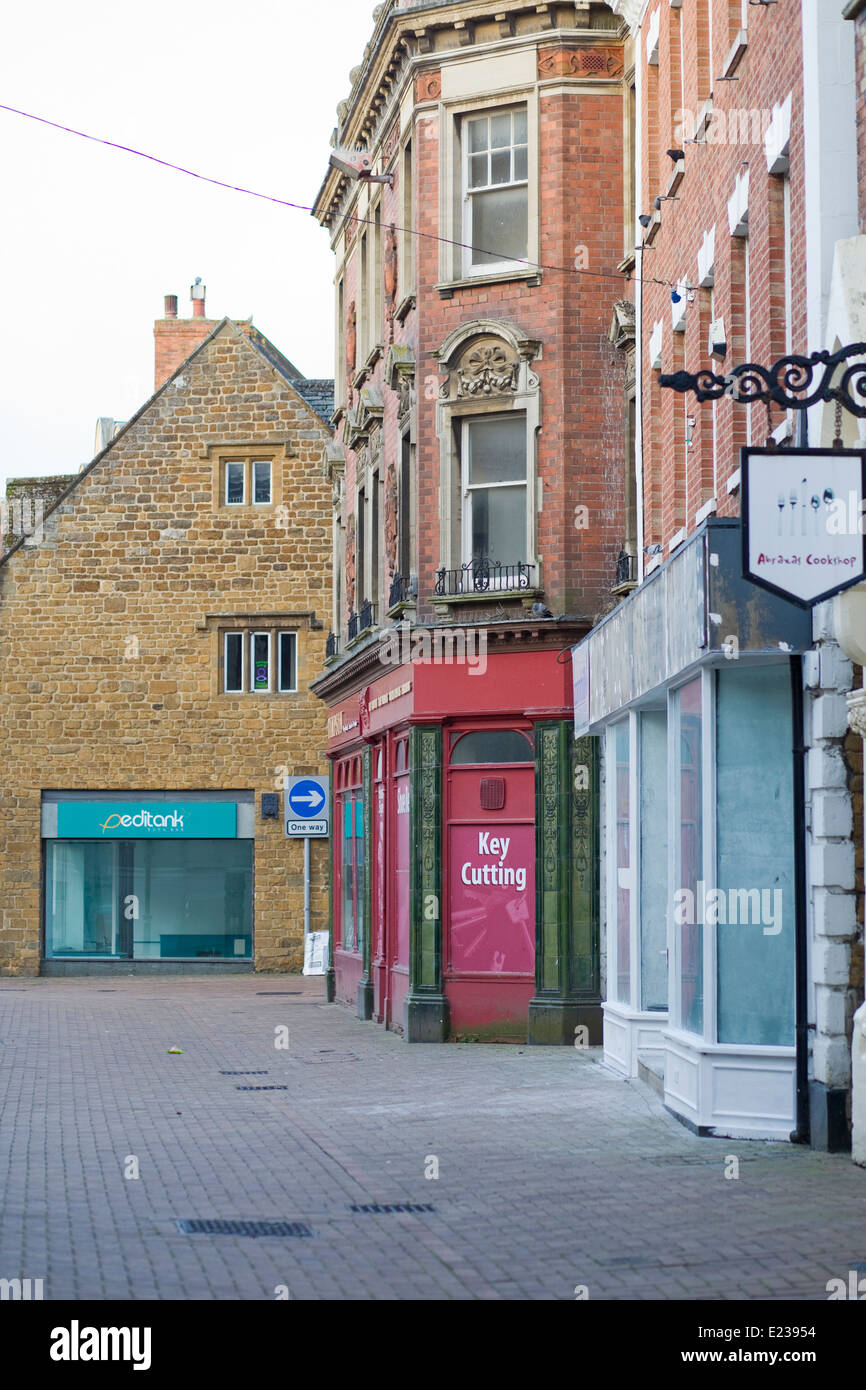 Deserted high street with closed down shops do to the economical ...