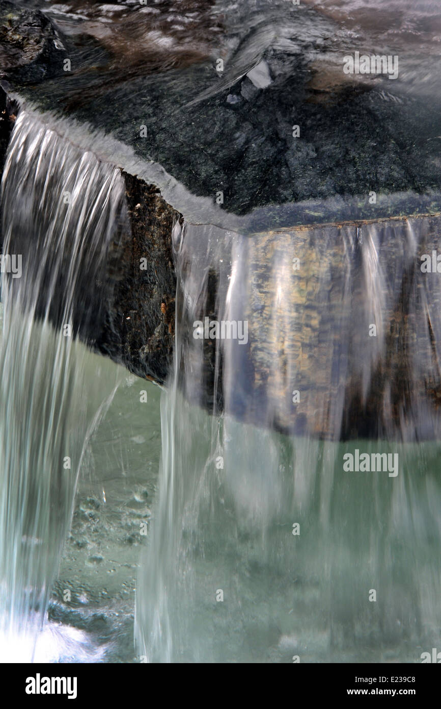 Water falling stone hi-res stock photography and images - Alamy