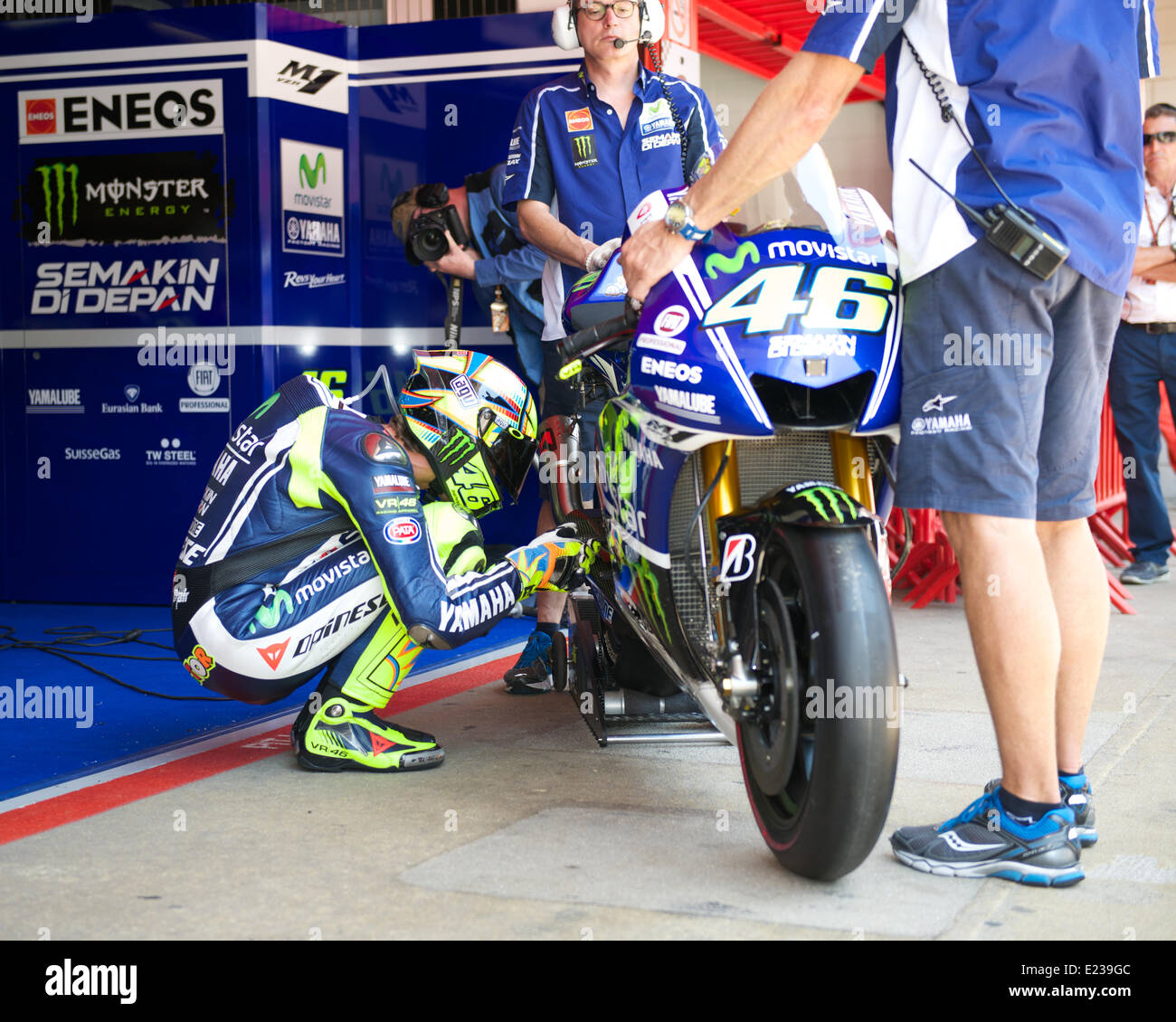 Barcelona, Spain. 14th June 2014. Valentino Rossi does his squatting ...