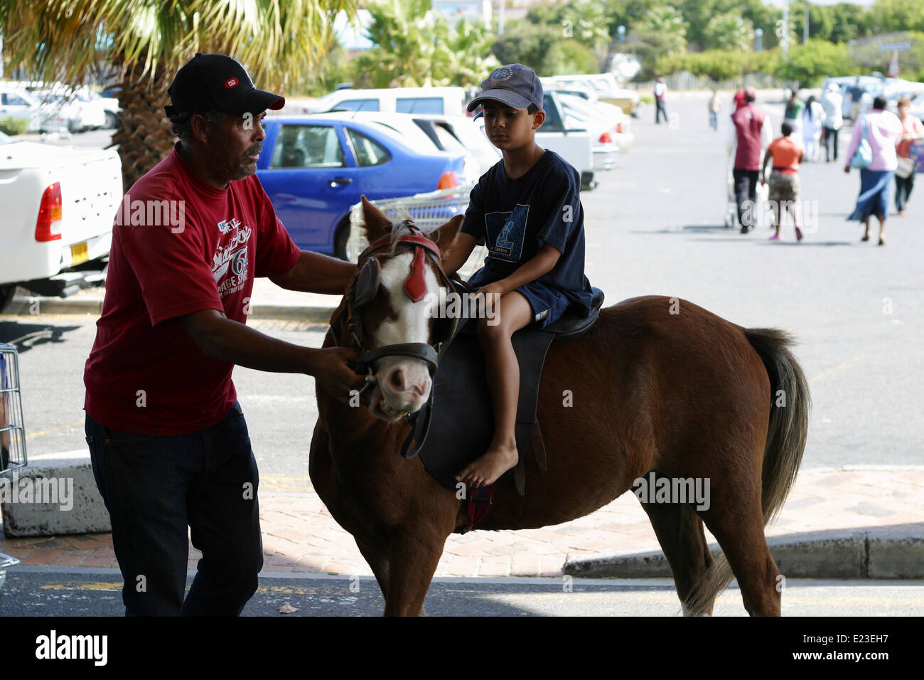 Promotional pony rides for children at a Cape Town shopping centre ...