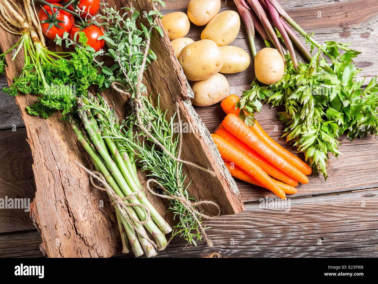 Fresh vegetables on bark Stock Photo - Alamy