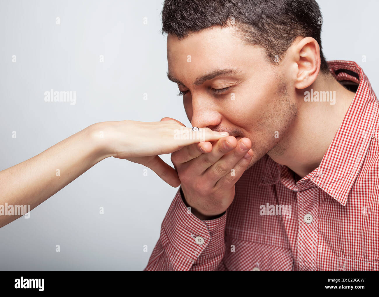 elegant man tenderly kissing the hand Stock Photo - Alamy