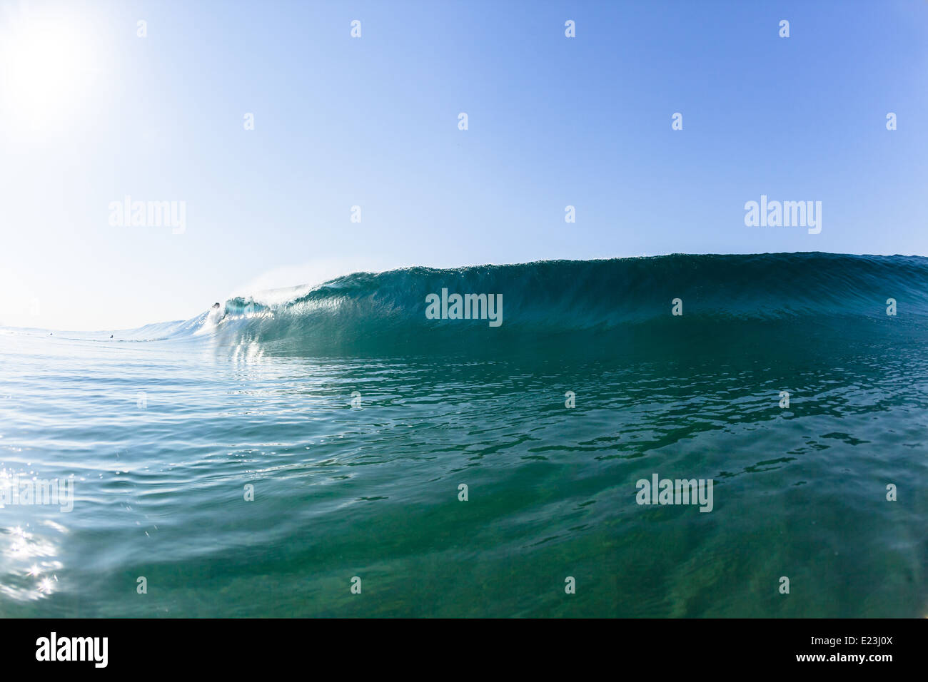 Ocean wave swimming inside closeup encounter crashing hollow blue water ...