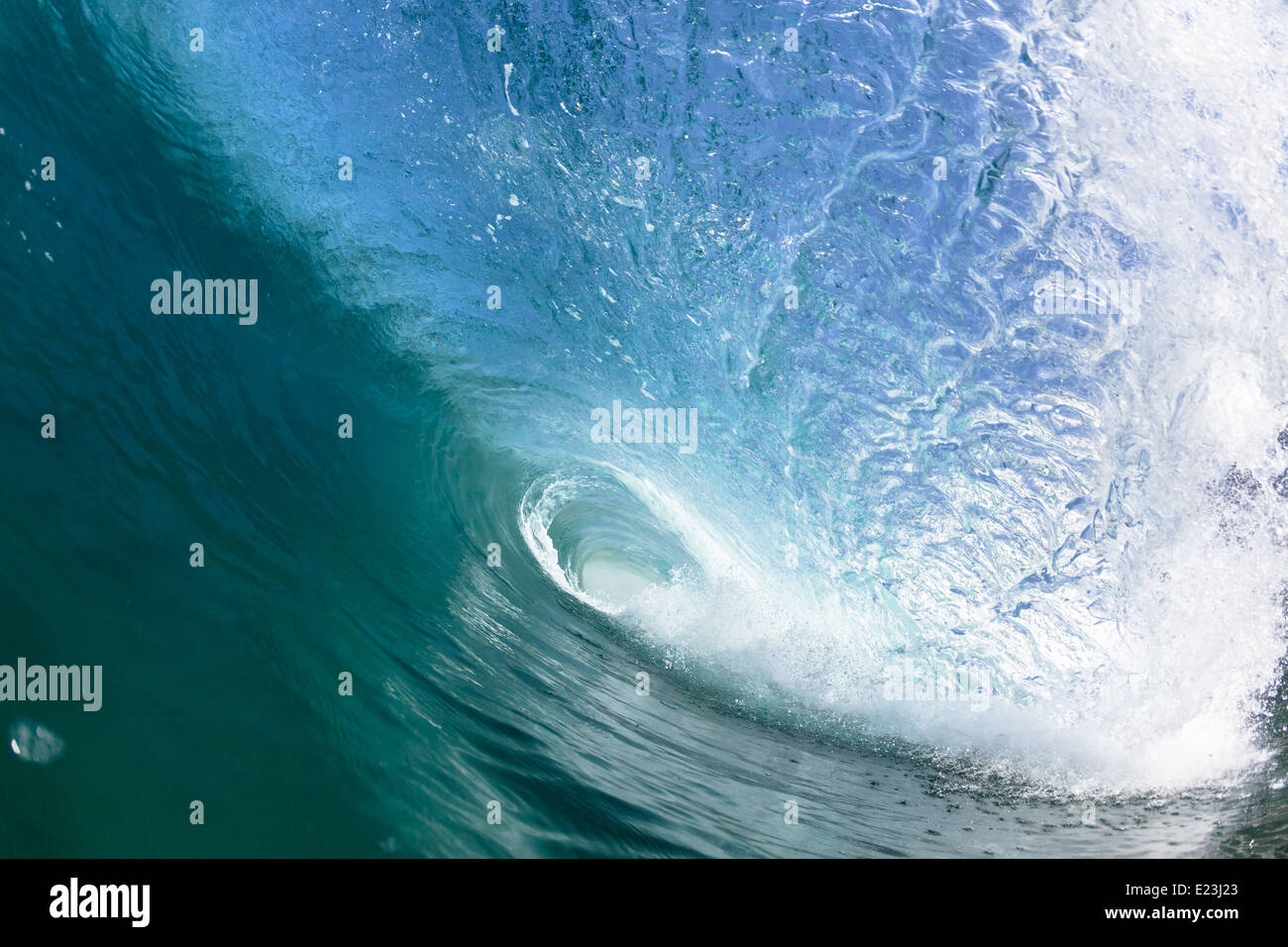 Ocean wave swimming inside closeup encounter crashing hollow blue water ...