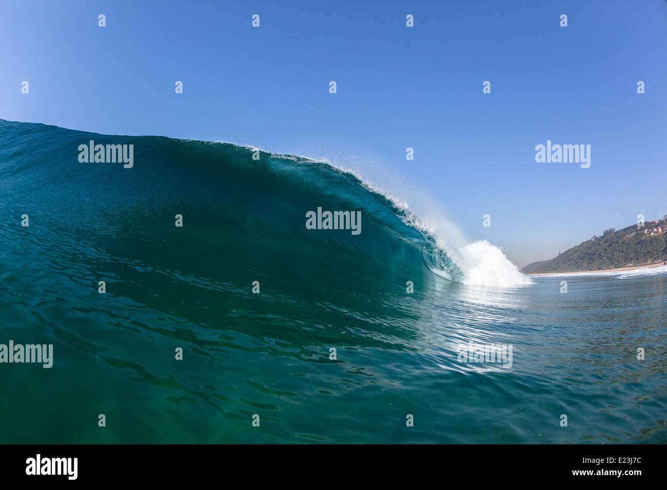 Ocean wave swimming inside closeup encounter crashing hollow blue water ...