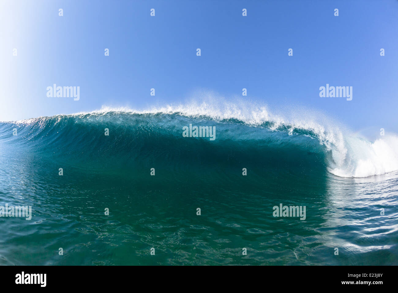 Ocean wave swimming inside closeup encounter crashing hollow blue water ...