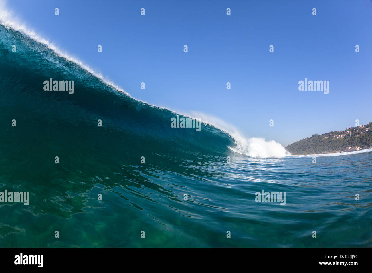 Ocean wave swimming inside closeup encounter crashing hollow blue water ...