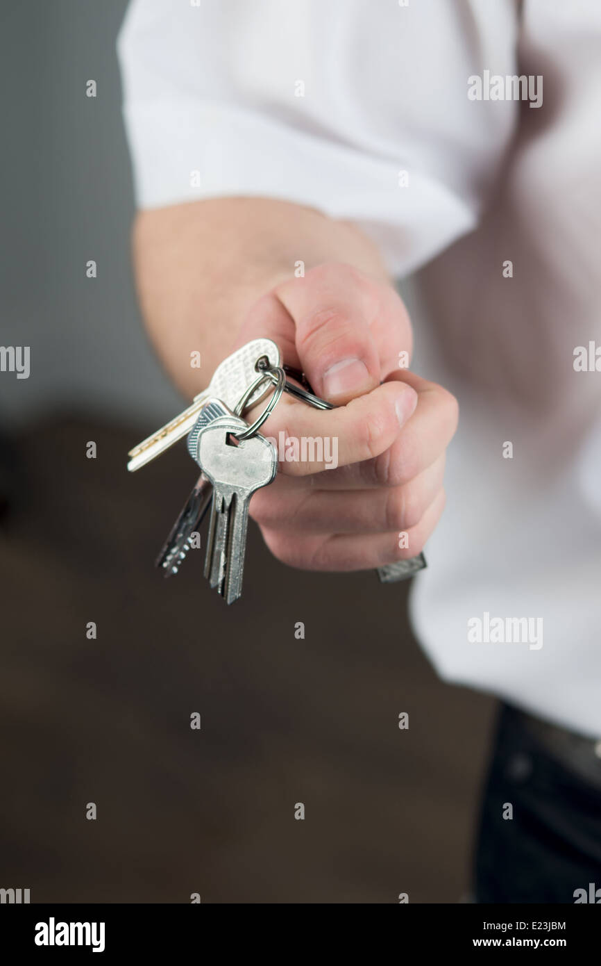 Man with keys Stock Photo - Alamy