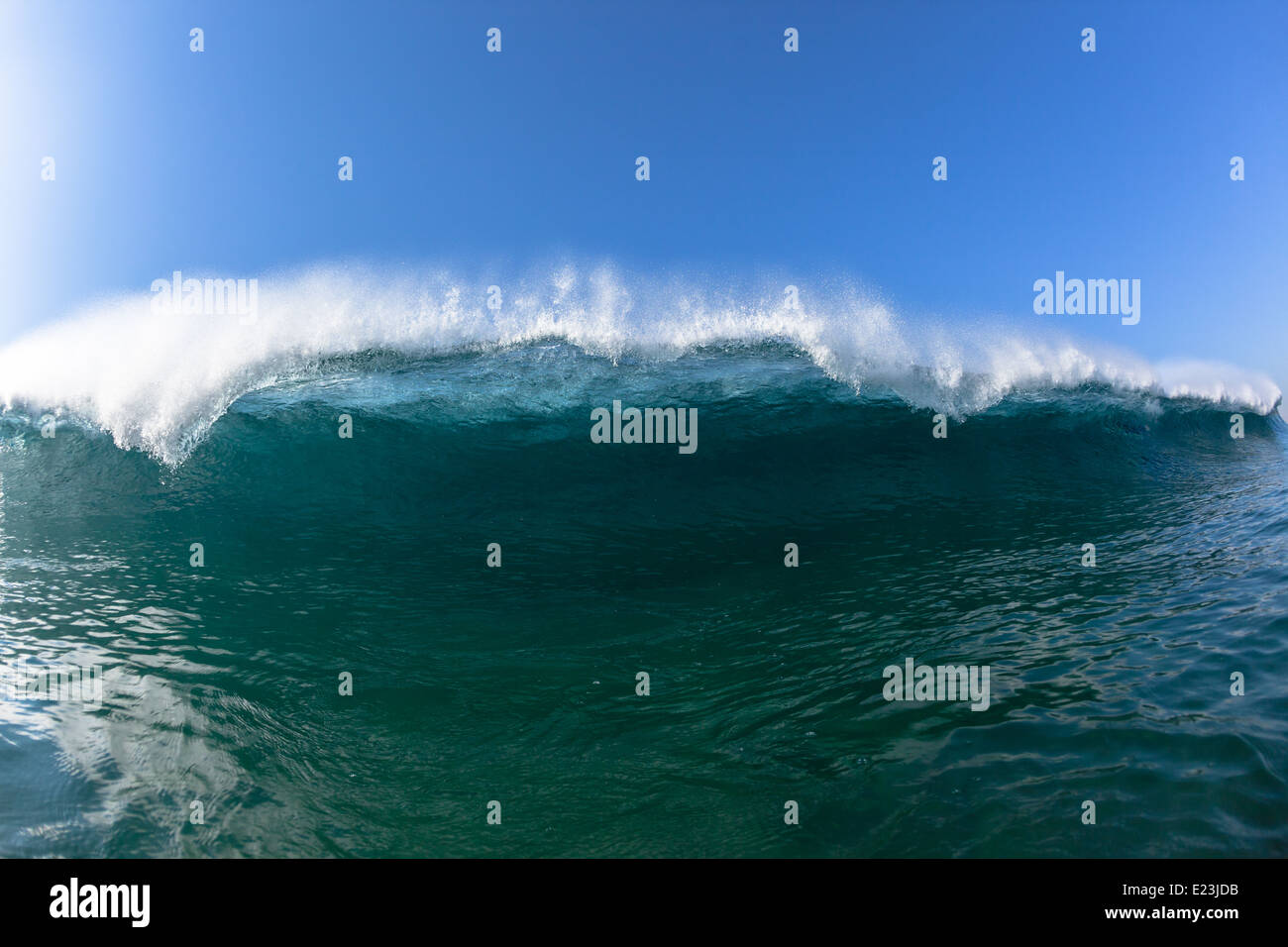 Ocean wave swimming inside closeup encounter crashing hollow blue water ...