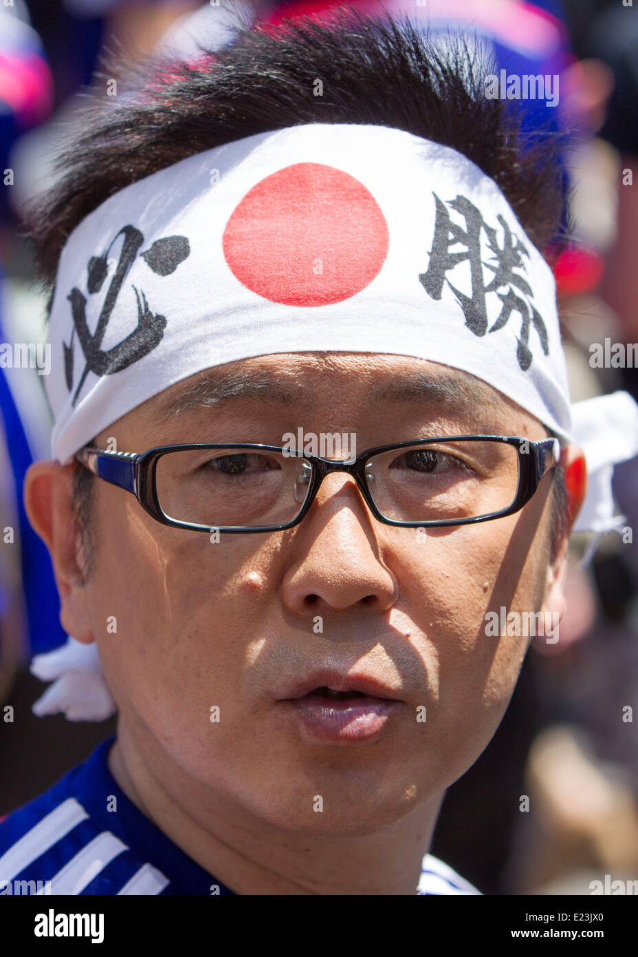 Tokyo, Japan. 15th June, 2014. A Japanese football fan attends a rally ...