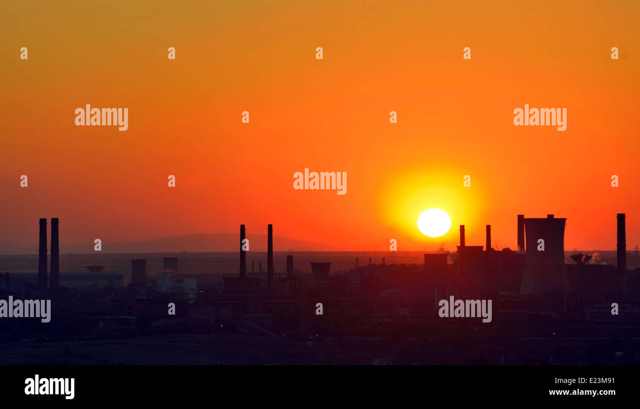 silhouette of industrial factory at sunset Stock Photo - Alamy