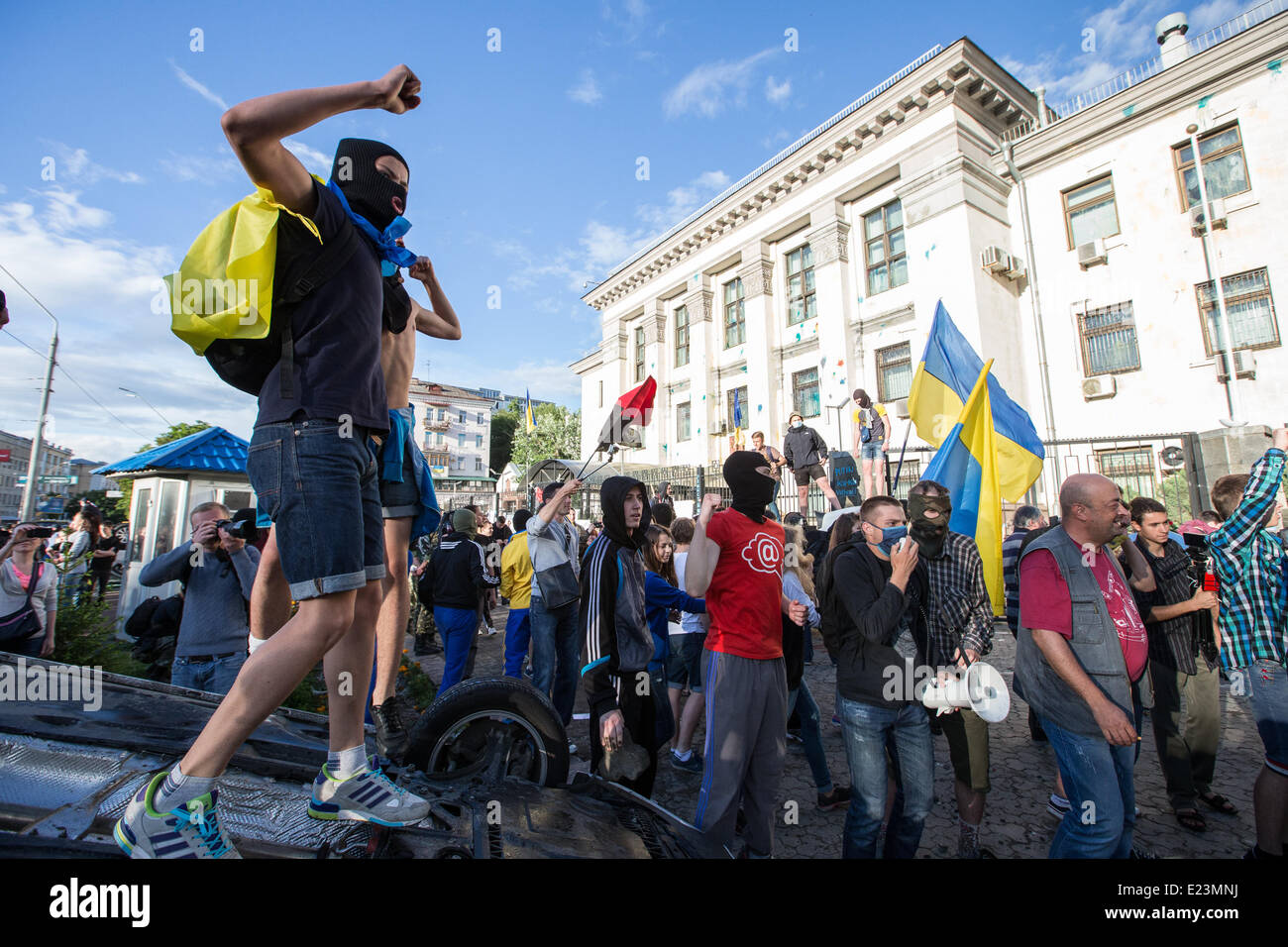 Pro-Ukrainian supporters stand in front of the Russian embassy during a ...