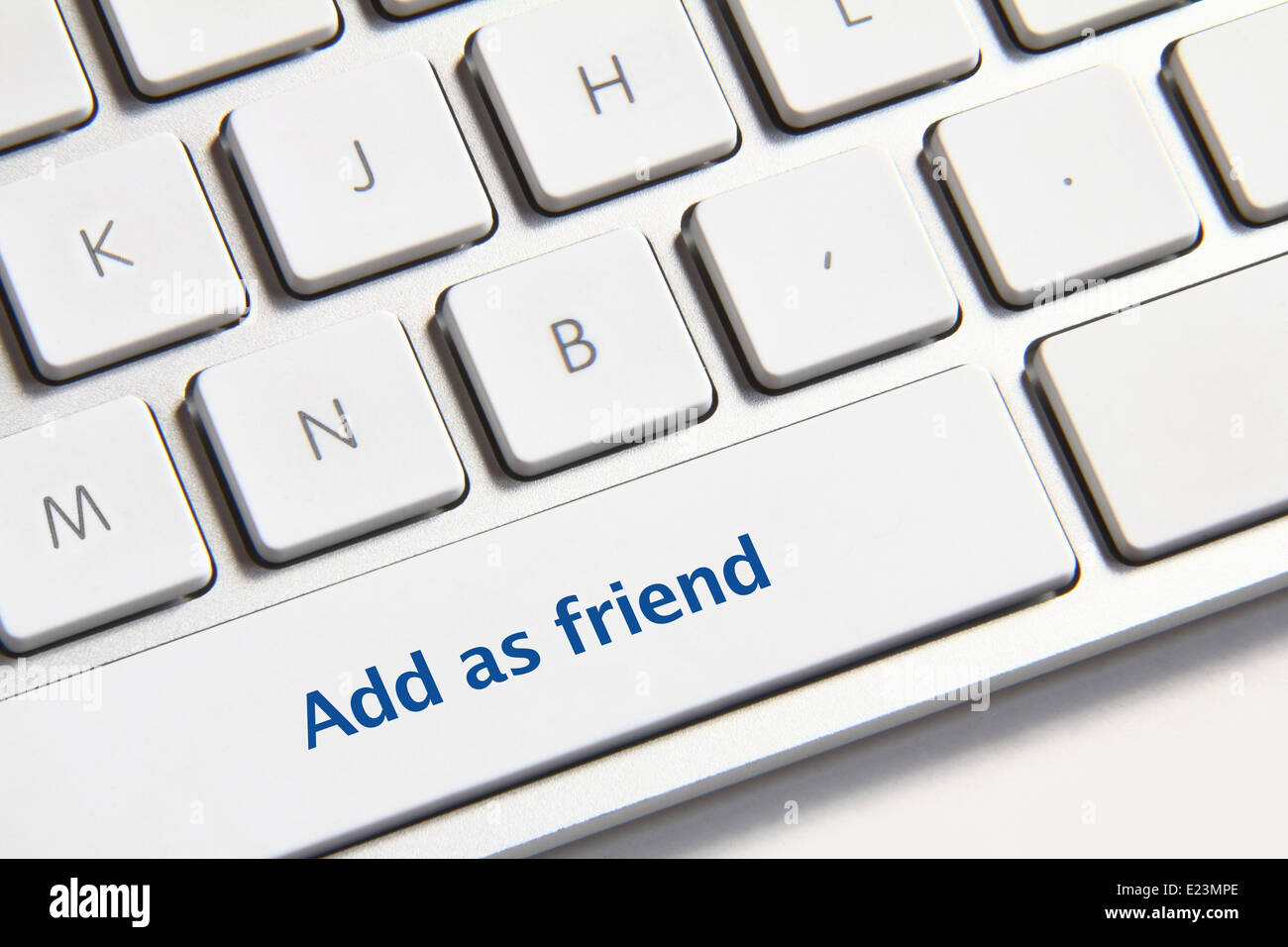 Photo of add as friend button on the white keyboard Stock Photo - Alamy