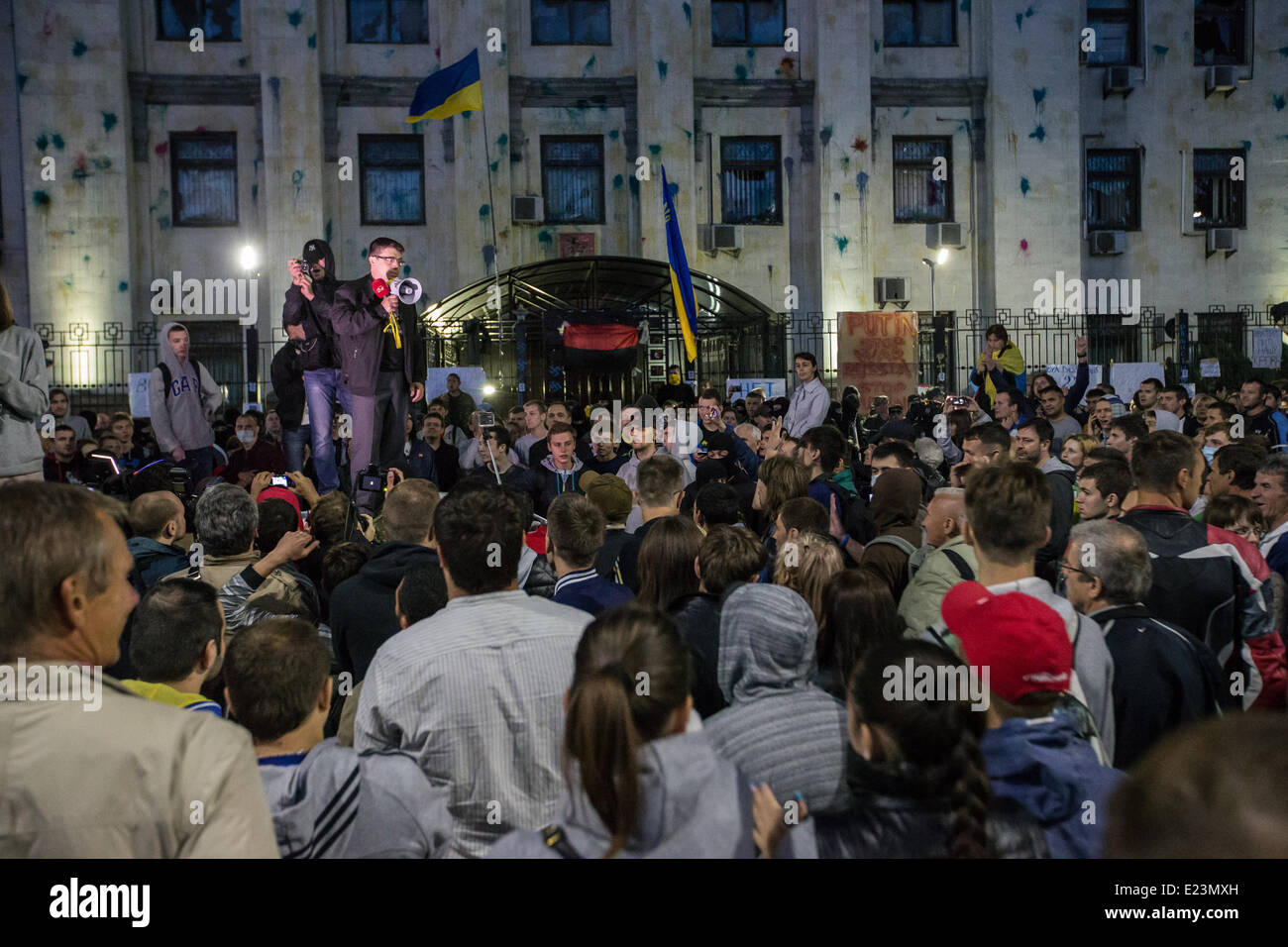 Pro-Ukrainian supporters stand in front of the Russian embassy during a ...